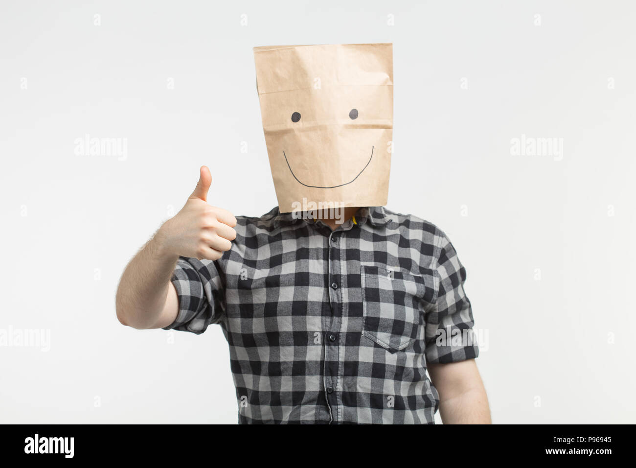 Thumbs up emoji mask hi-res stock photography and images - Alamy