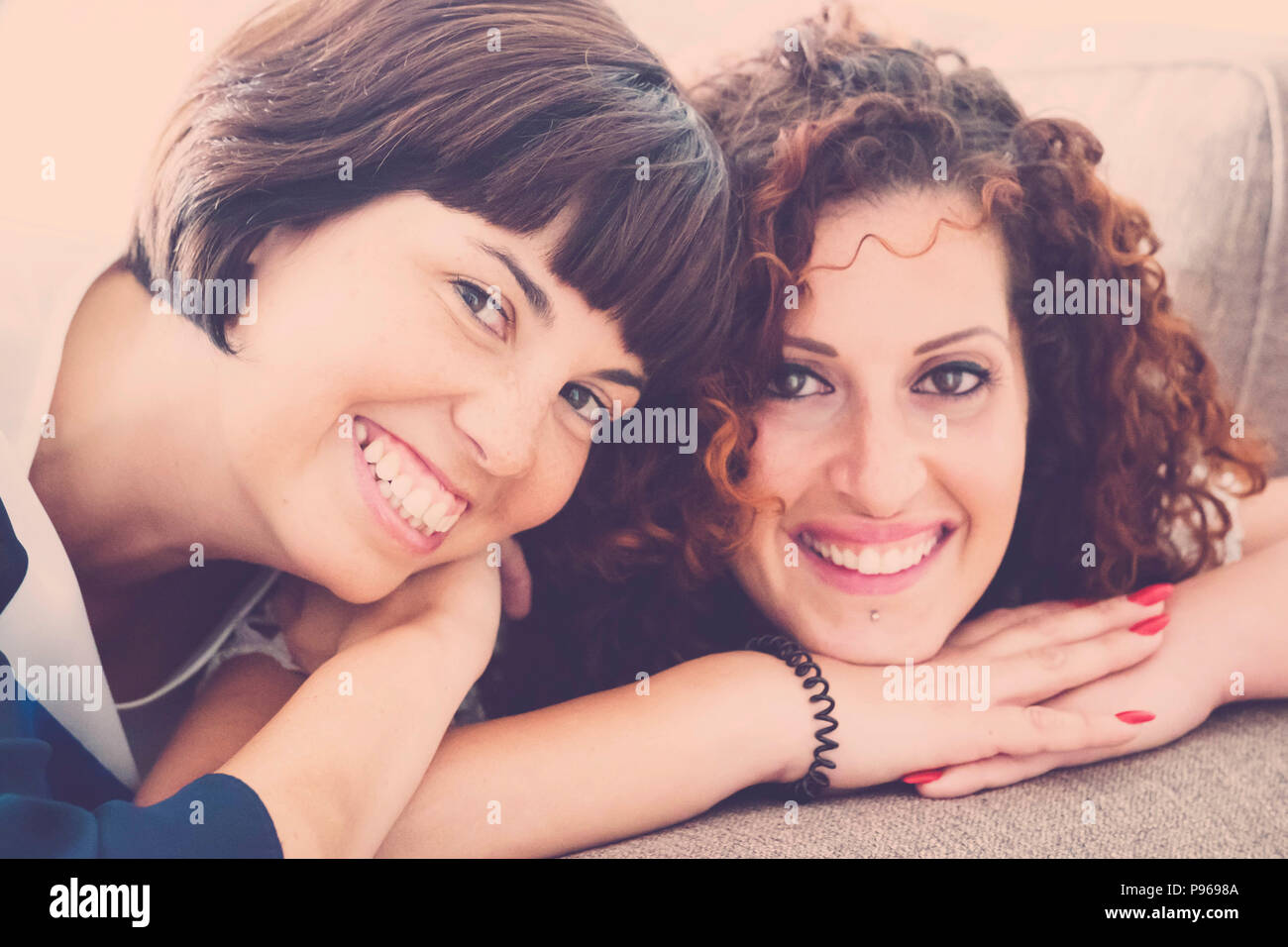 nice time and happiness with laugh and smiles for two caucasian friends ...