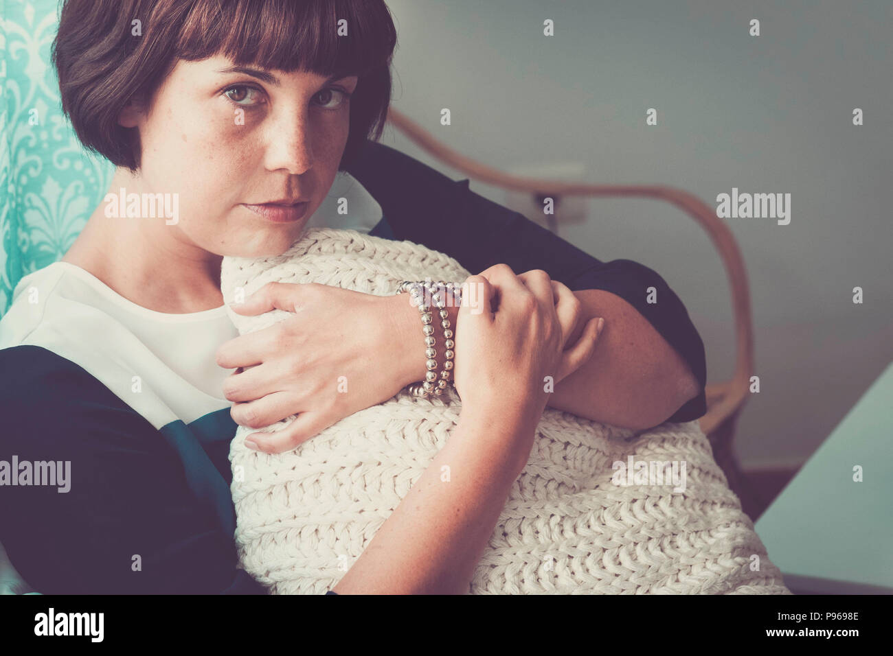 sad and loneliness at home for young caucasian female. sadly expression ...