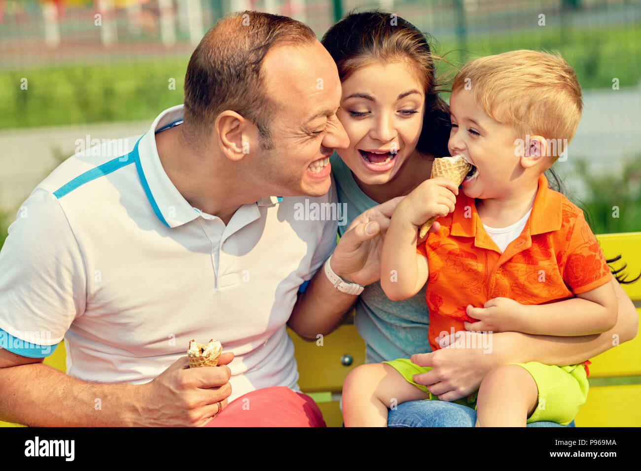 family eating ice cream Stock Photo - Alamy