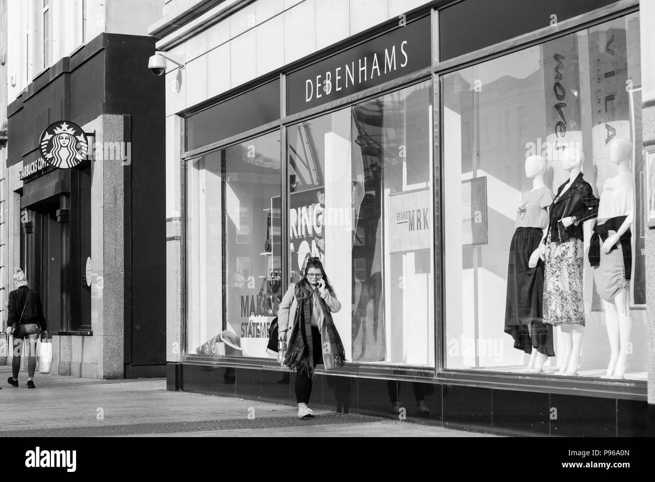 Cork, Ireland - people shopping on Patrick Street, the main street for ...
