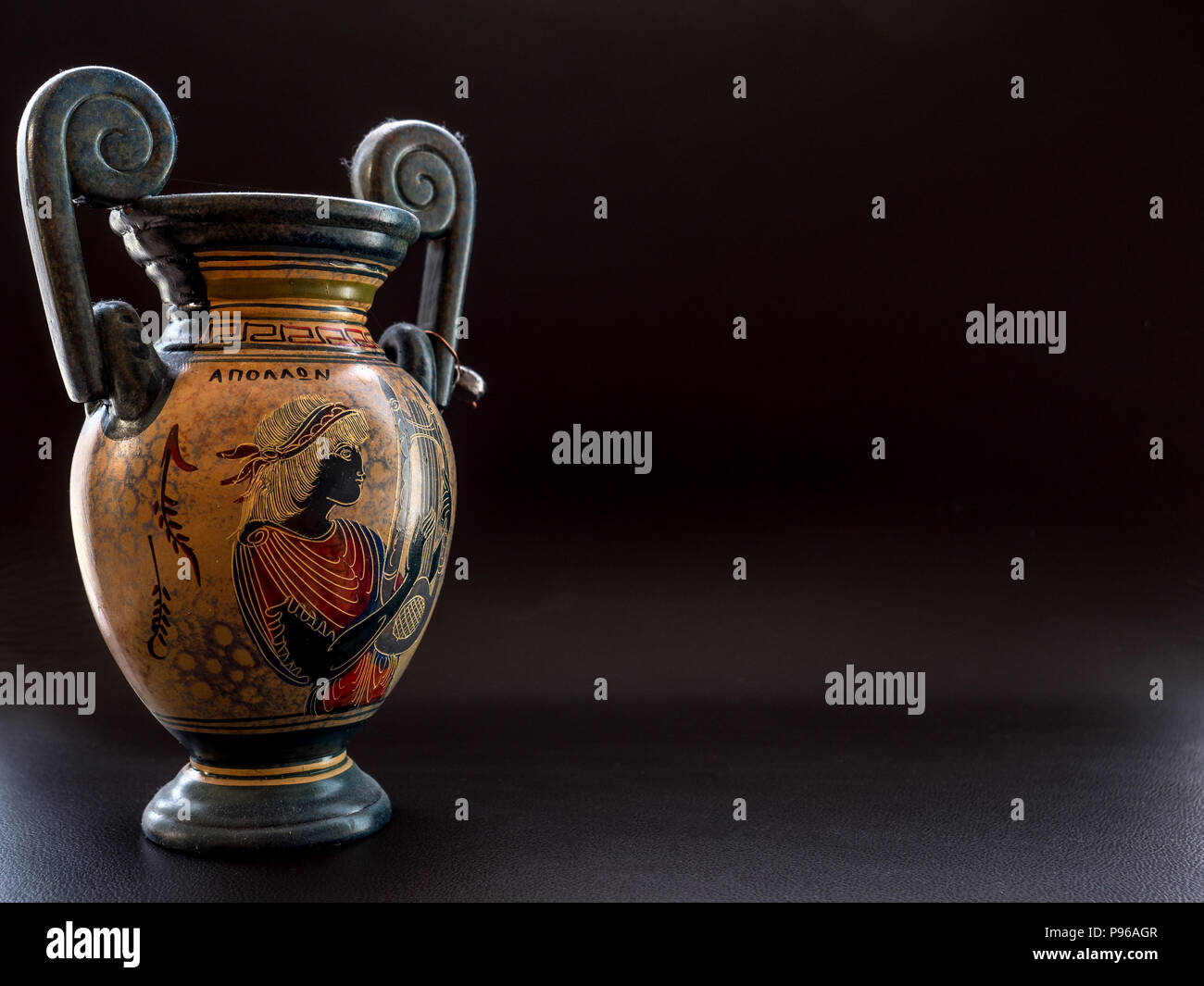 ancient vintage greek vase on black background with space for text ...