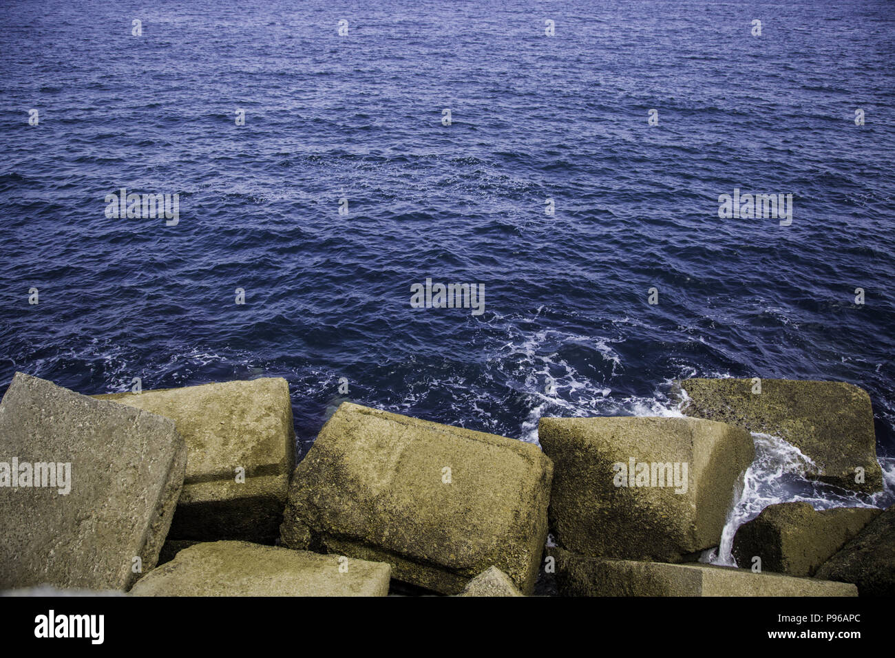 Volcanic rocks breakwater hi-res stock photography and images - Alamy