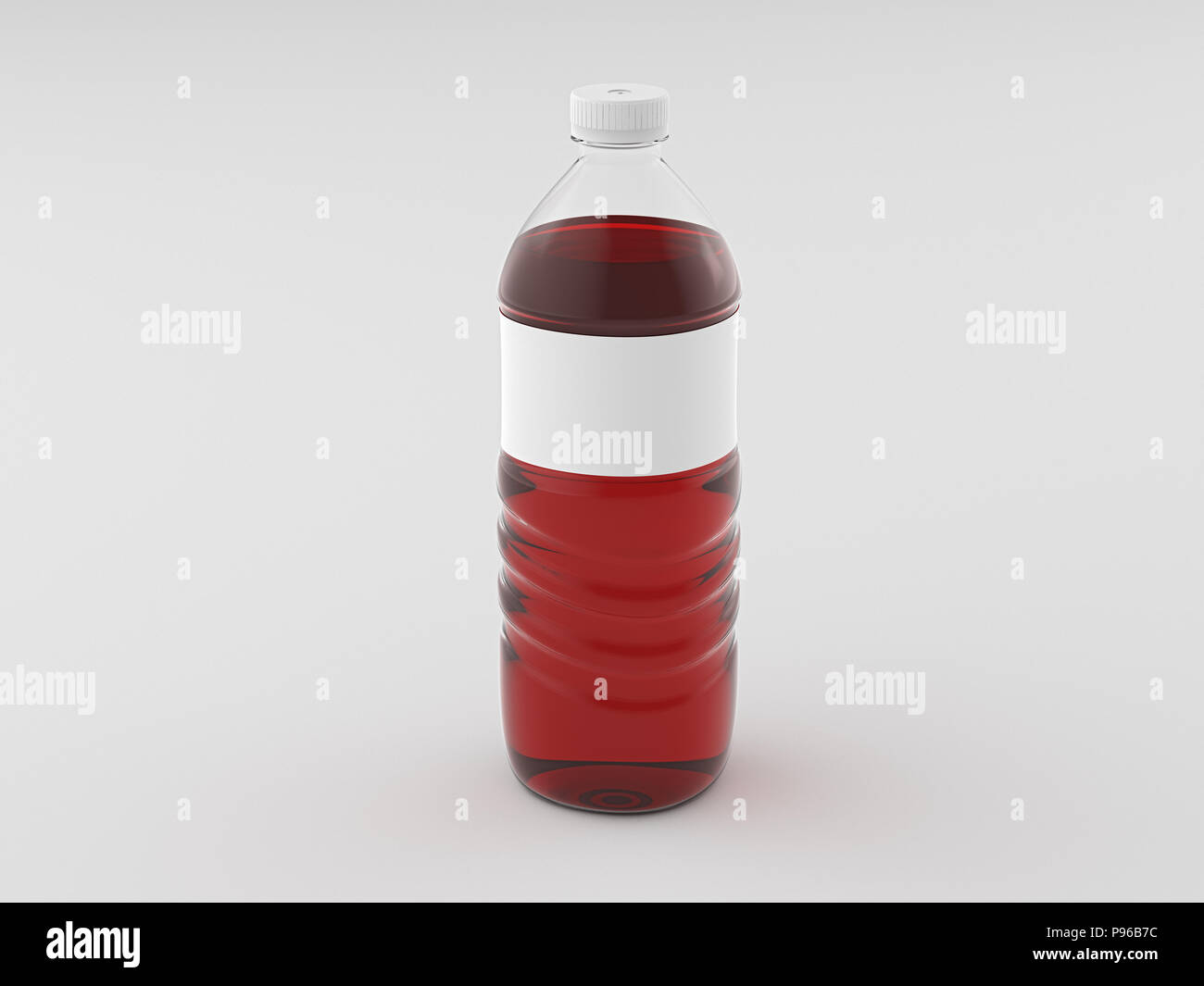 Plastic bottle of red water with blank label isolated on white ...