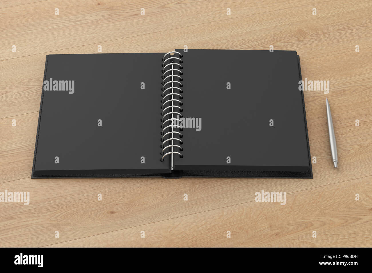 Blank black facing pages of notebook on a spring with leather cover and ...