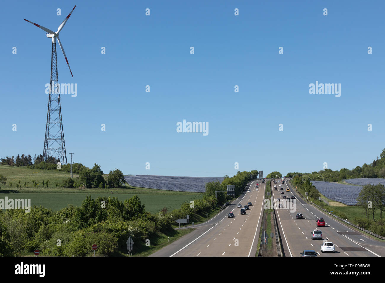 wind turbine and solar plant near the highway A7 Stock Photo - Alamy