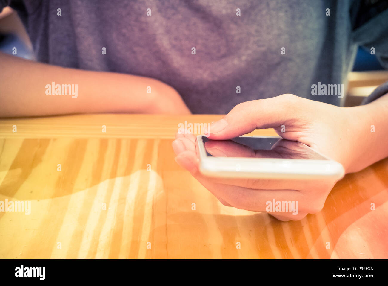 Person with phone using a filter hi-res stock photography and images ...