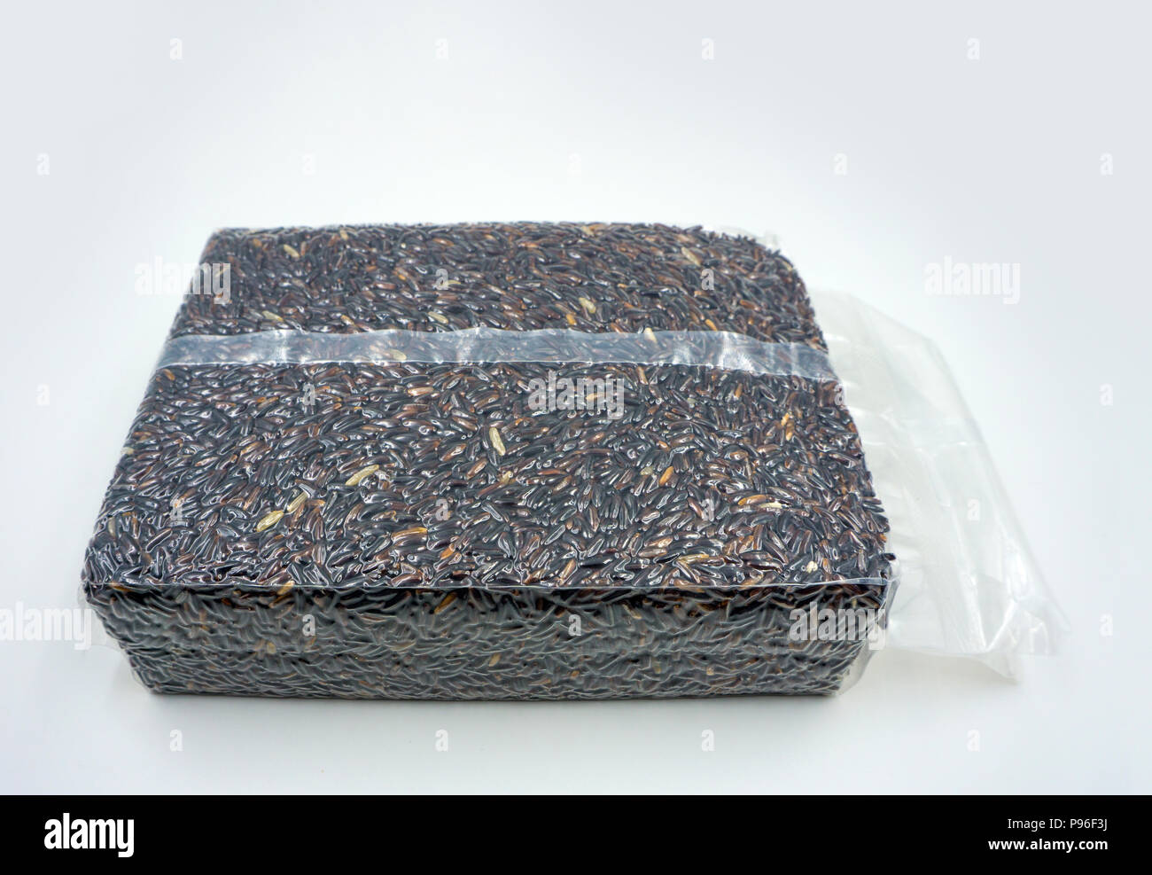 Thai rice berry in plastic bag on white background Stock Photo - Alamy