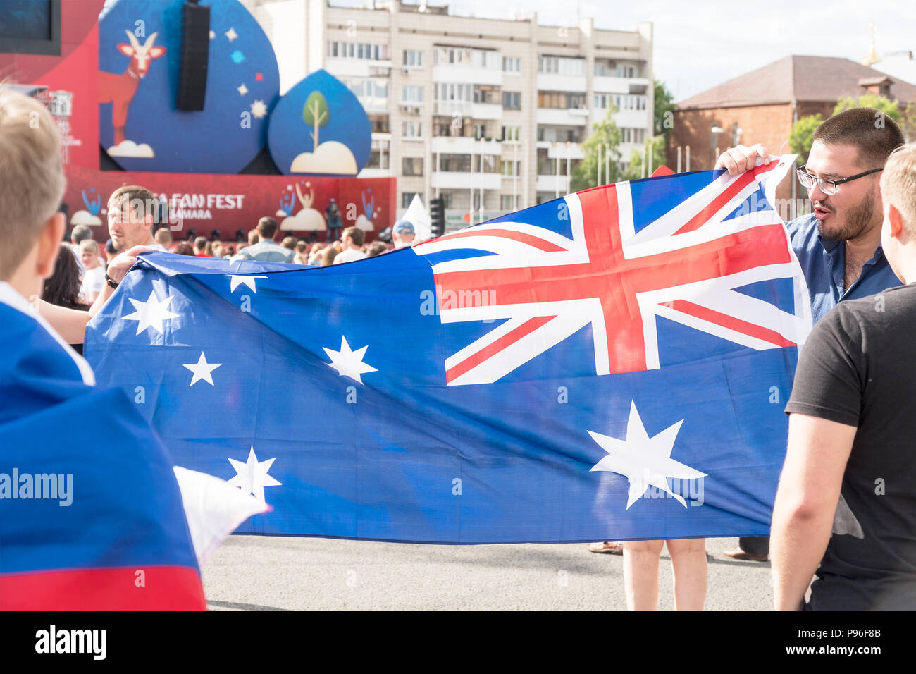 Football fans with the flag of Australia in the fan zone Stock Photo ...