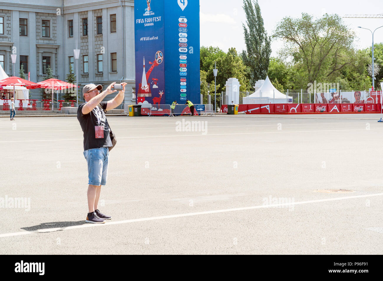 The man is taking pictures while in the fan zone of the 2018 FIFA World ...