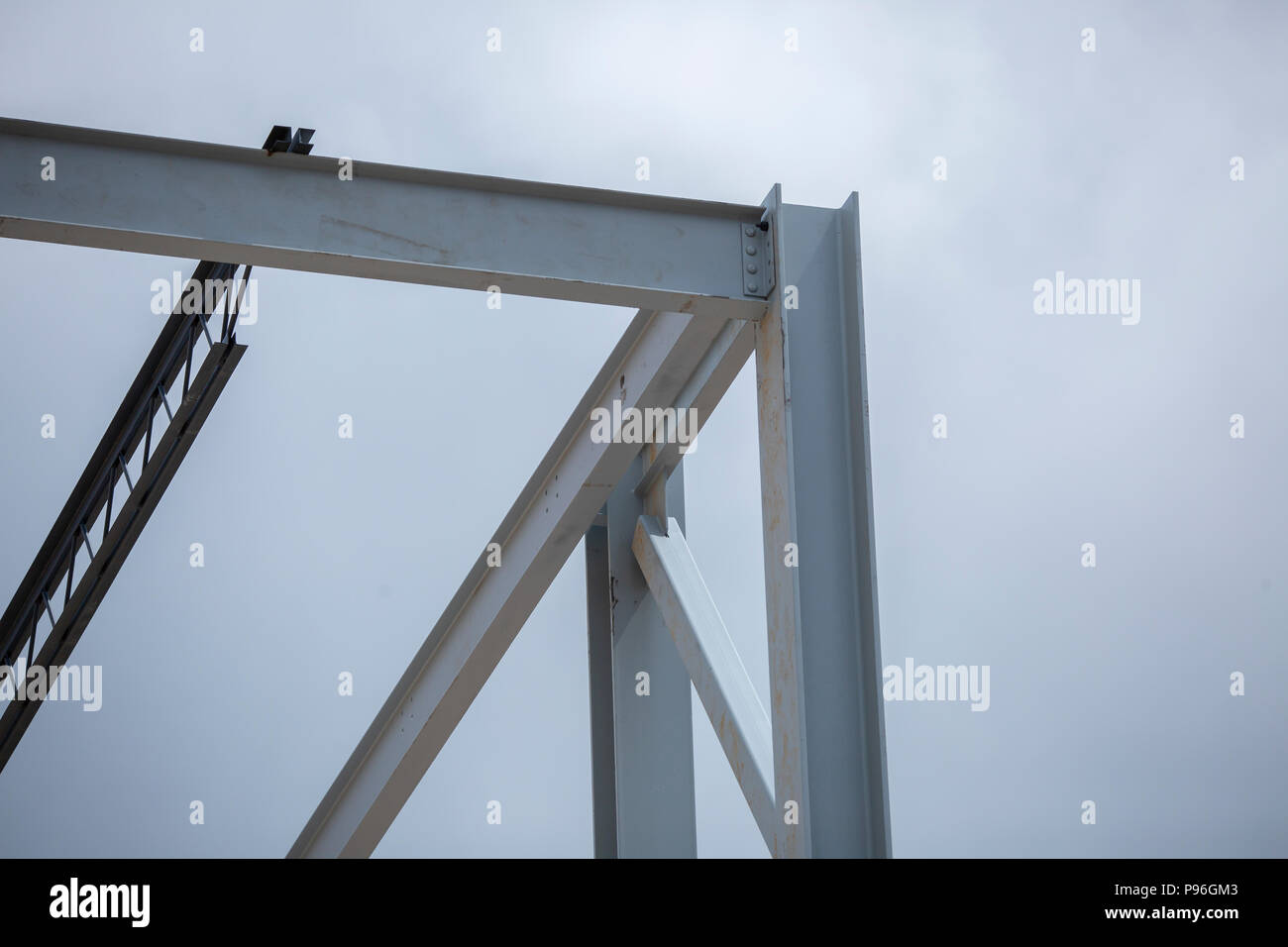 Top corner of steel beams that have been connected to erect a new ...