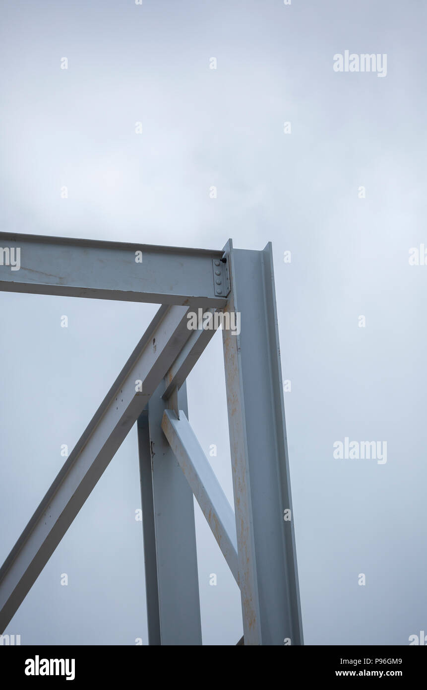 Top corner of steel beams that have been connected to erect a new ...