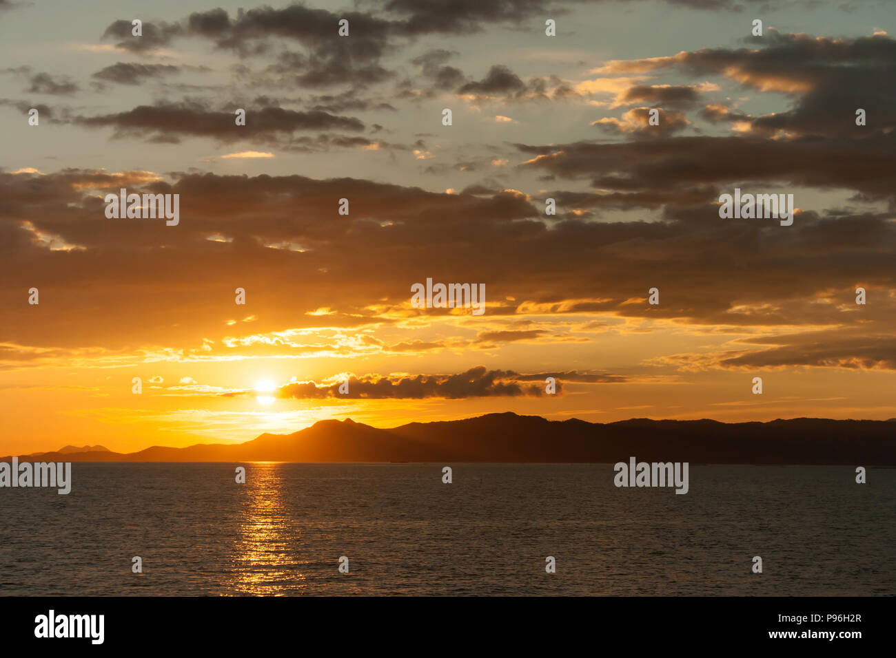 Abstract sunset above sea hi-res stock photography and images - Alamy