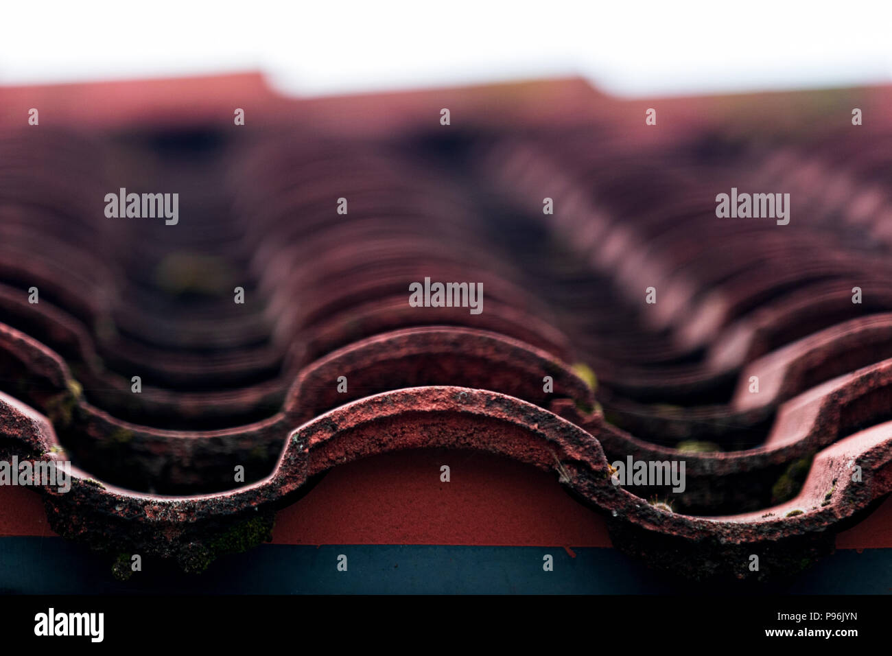 Aged worn brick shingles looking up in to a blurry top Stock Photo - Alamy