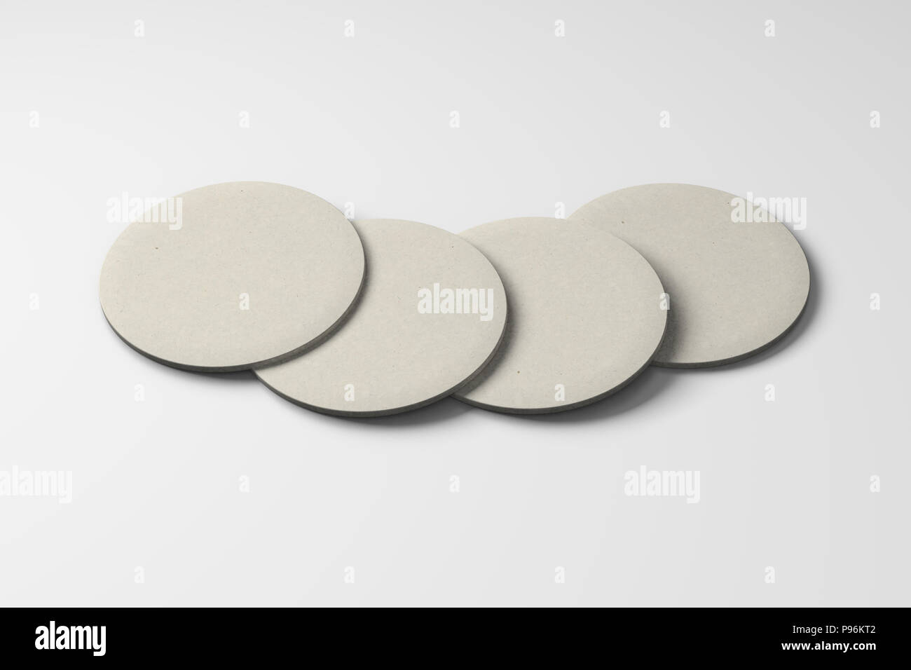 White coasters. Isolated on white background. Include clipping path. 3d ...