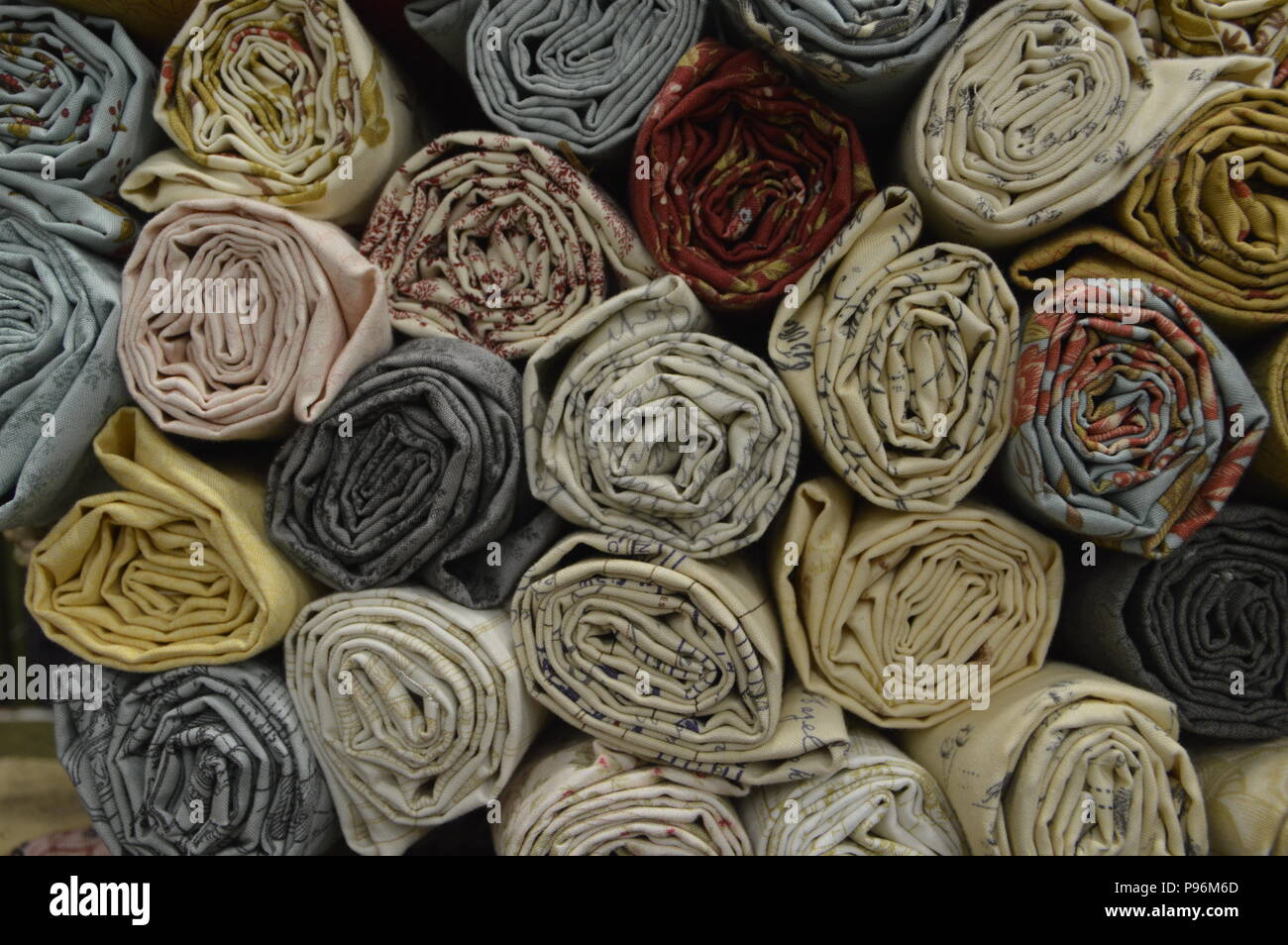Rolled up fabric rolls used in Quilt making or other sewing crafts ...