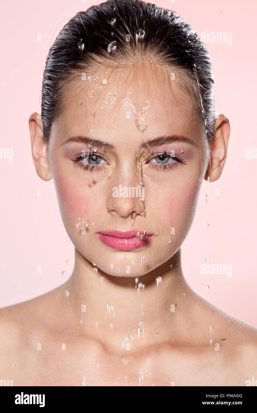 Beautiful Model Girl with splashes of water on her face. Beautiful ...