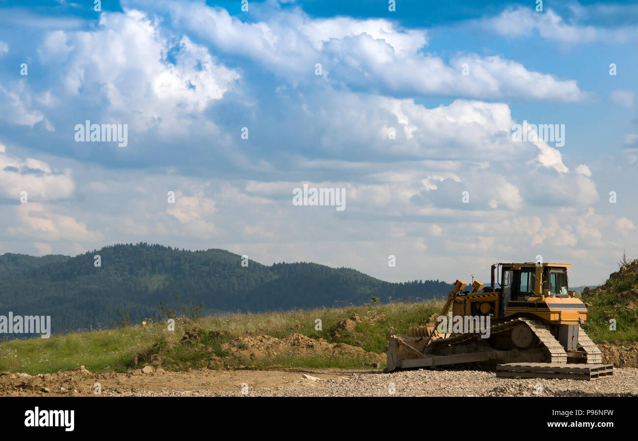bulldozer a moving land shovel Stock Photo - Alamy