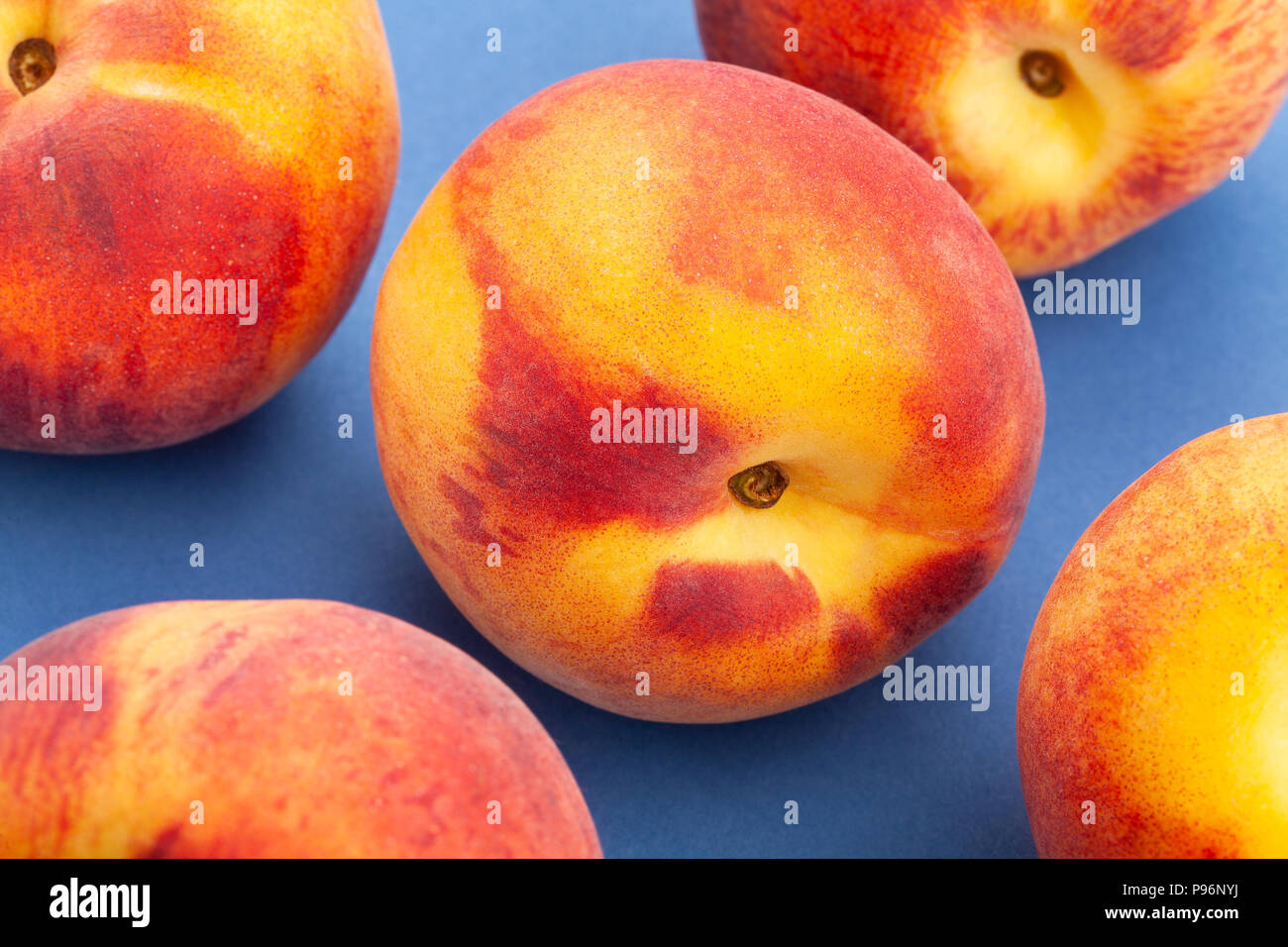 peach on blue background Stock Photo - Alamy