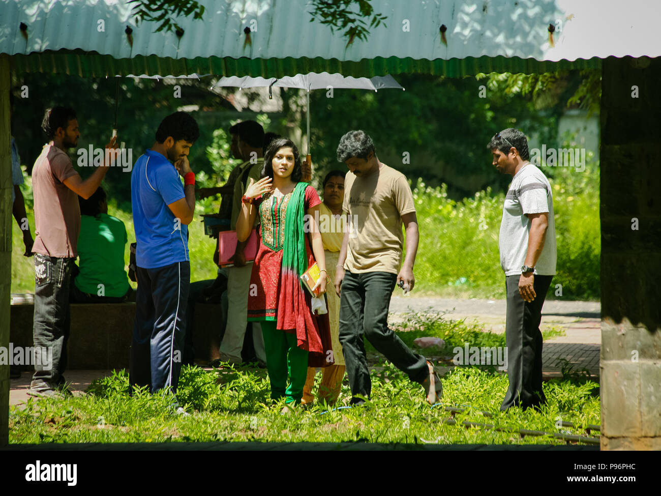 Film crew team filming movie scene on outdoor location. Group cinema ...