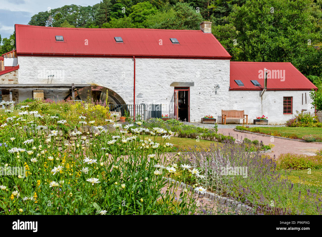 TRADITIONAL OLD WOOL MILL KNOCKANDO MORAY SCOTLAND RESTORED RED AND ...