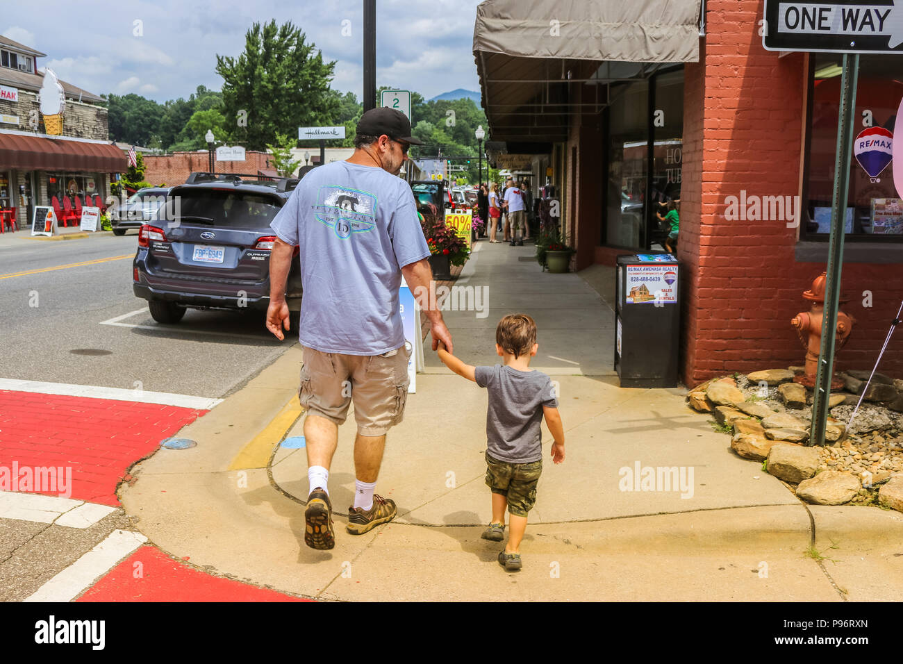 School boy walking out of school hi-res stock photography and images ...