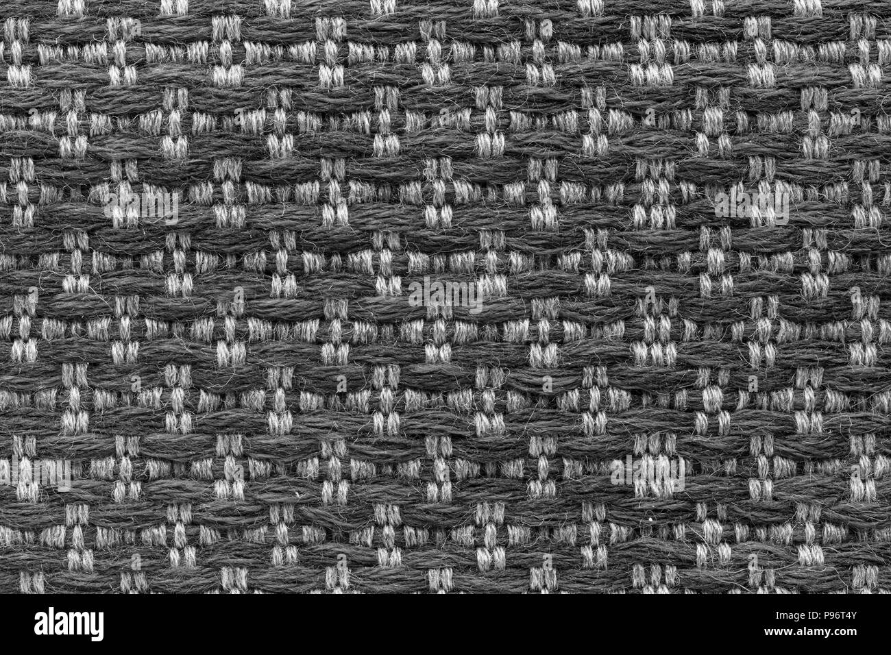 Black hand weaving matting tweed fabric texture. Closeup horizontal ...