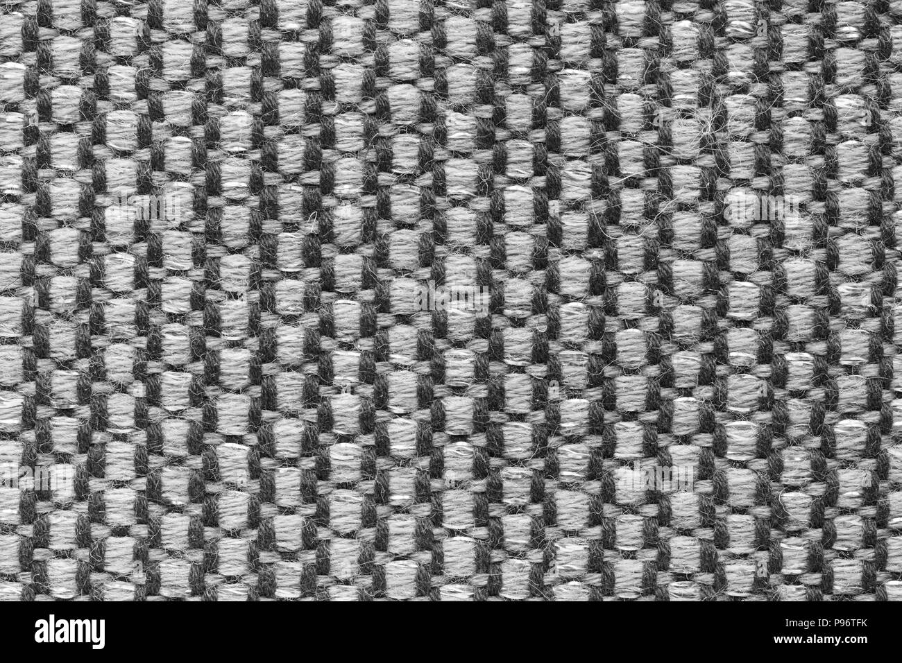 Black hand weaving matting tweed fabric texture. Closeup horizontal ...