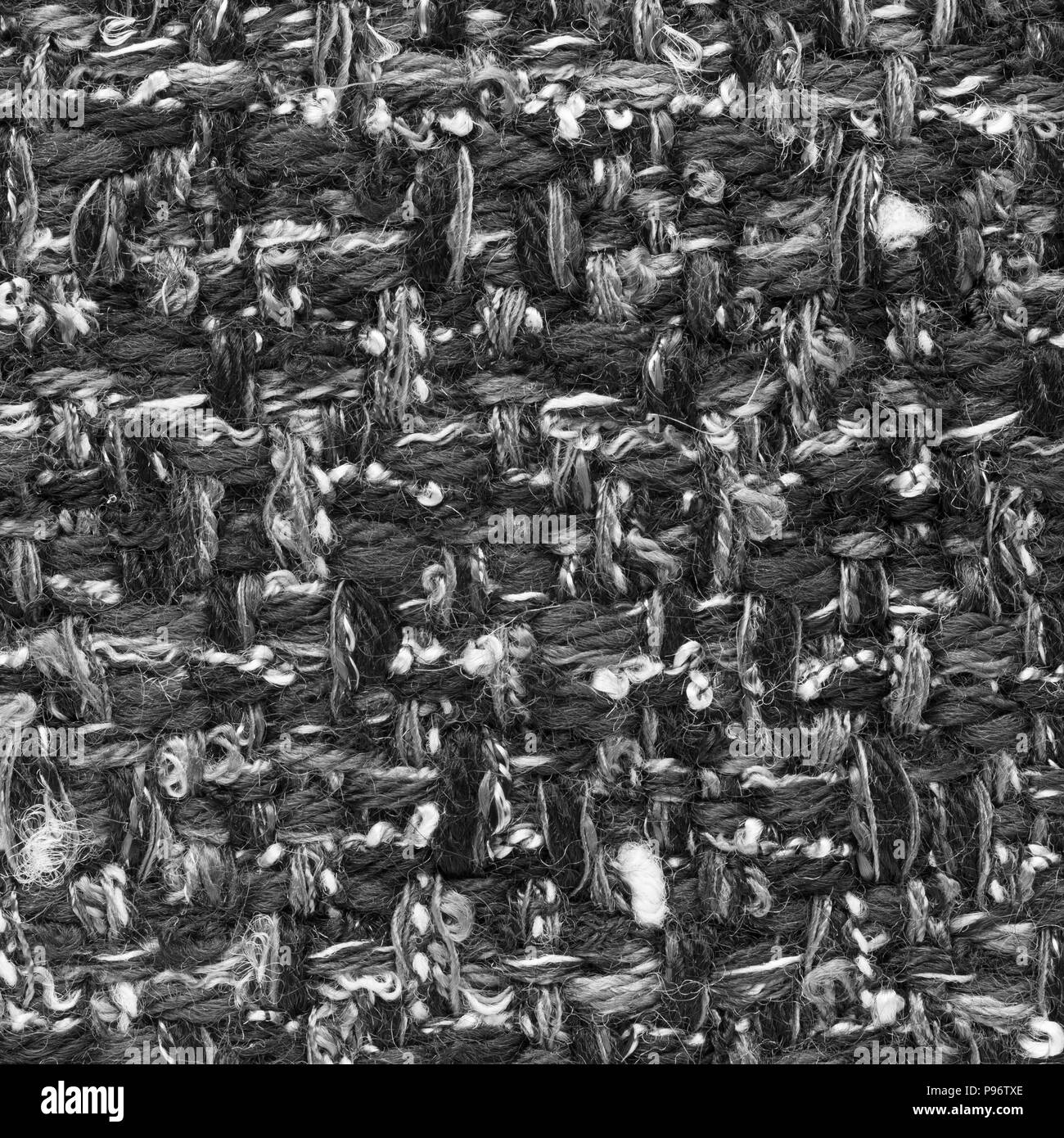 Black hand weaving matting tweed fabric texture. Closeup square ...