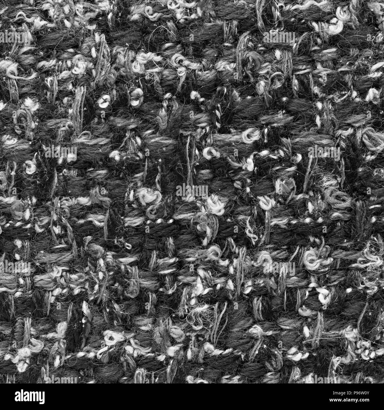 Black hand weaving matting tweed fabric texture. Closeup square ...