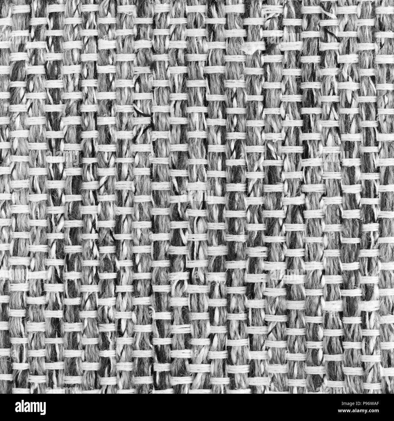 Black hand weaving matting tweed fabric texture. Closeup square ...