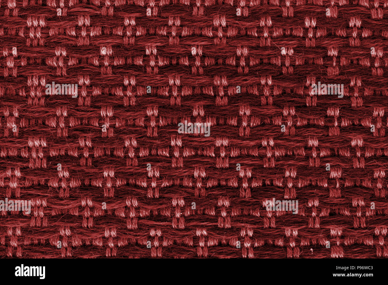 Red hand weaving matting tweed fabric texture. Closeup horizontal ...