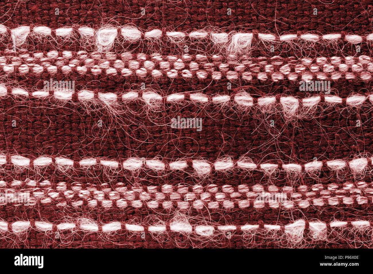 Red hand weaving matting tweed fabric texture. Closeup horizontal ...