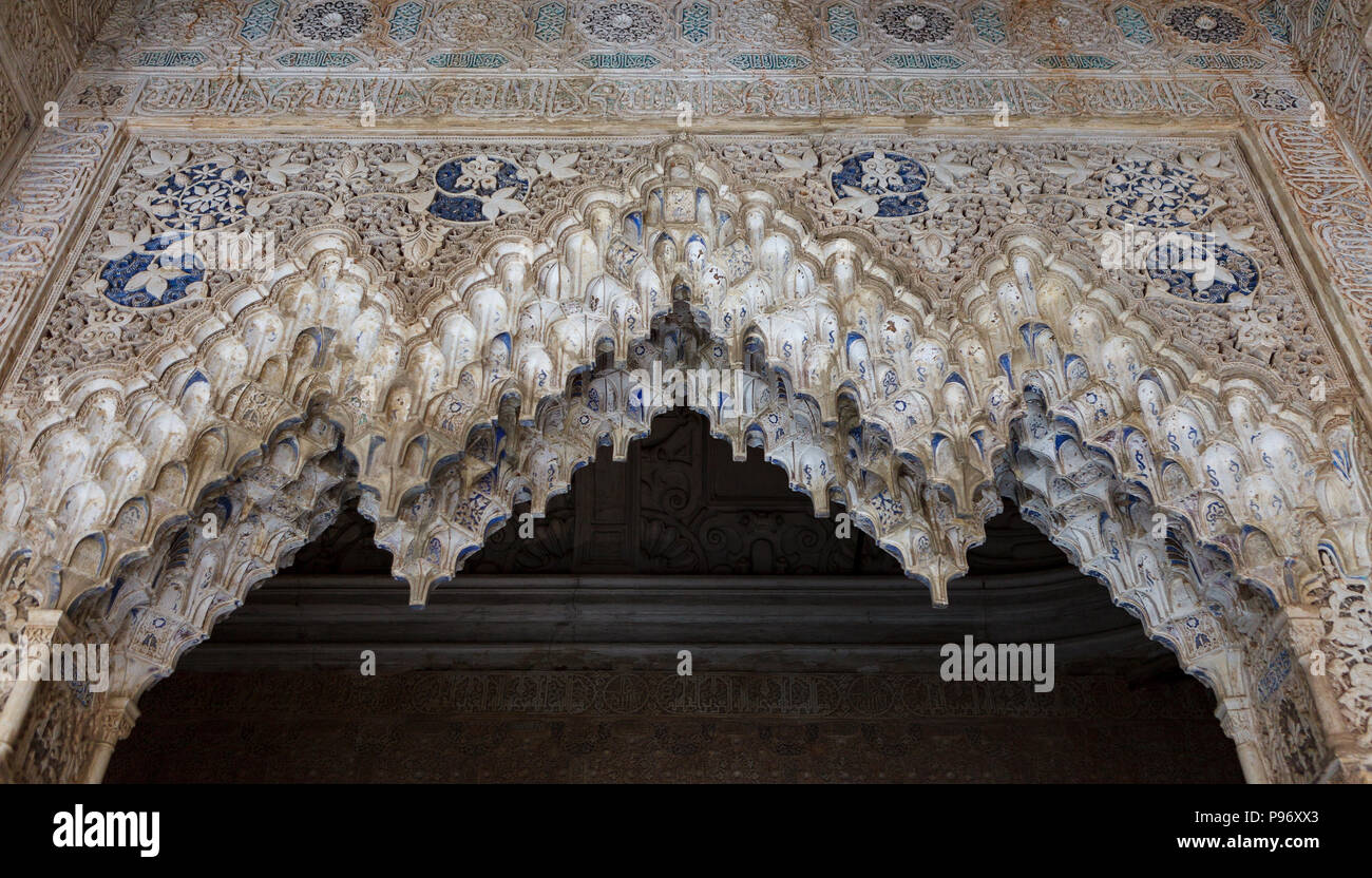 Interior of Alhambra, Granada. Columns with muqarnas ceiling decoration ...