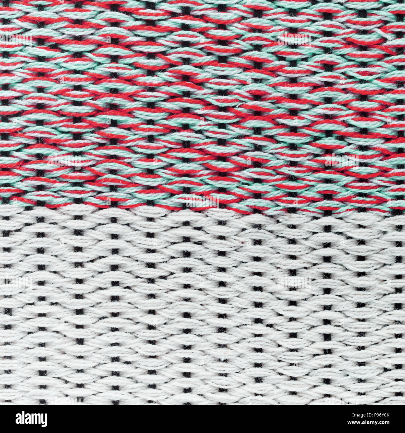 Red hand weaving matting tweed fabric texture. Closeup square fragment ...