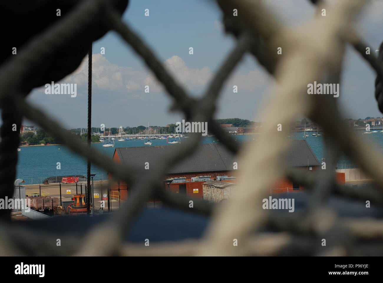rope net of a ship in front of a dockyard Stock Photo - Alamy