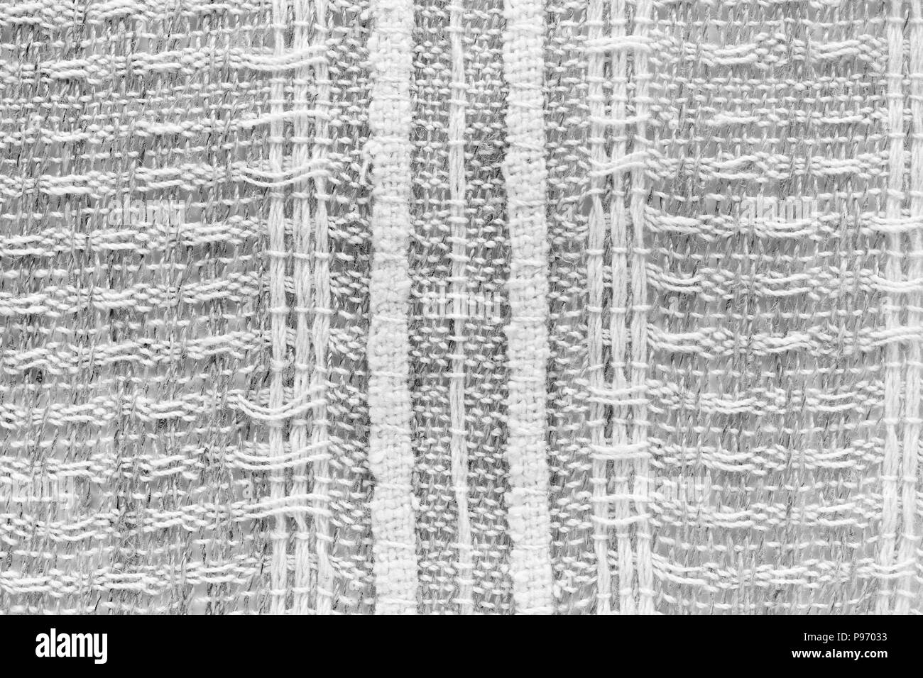 White hand weaving matting tweed fabric texture. Closeup horizontal ...