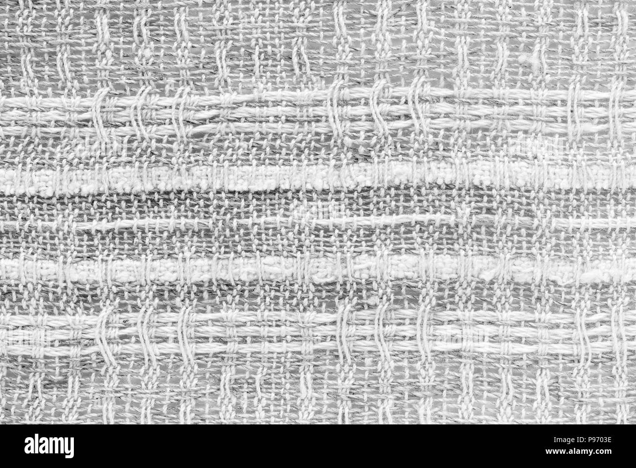 White hand weaving matting tweed fabric texture. Closeup horizontal ...