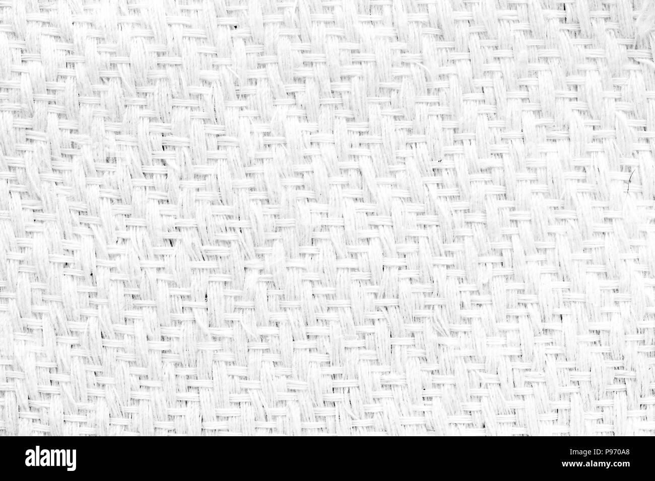 White hand weaving matting tweed fabric texture. Closeup horizontal ...