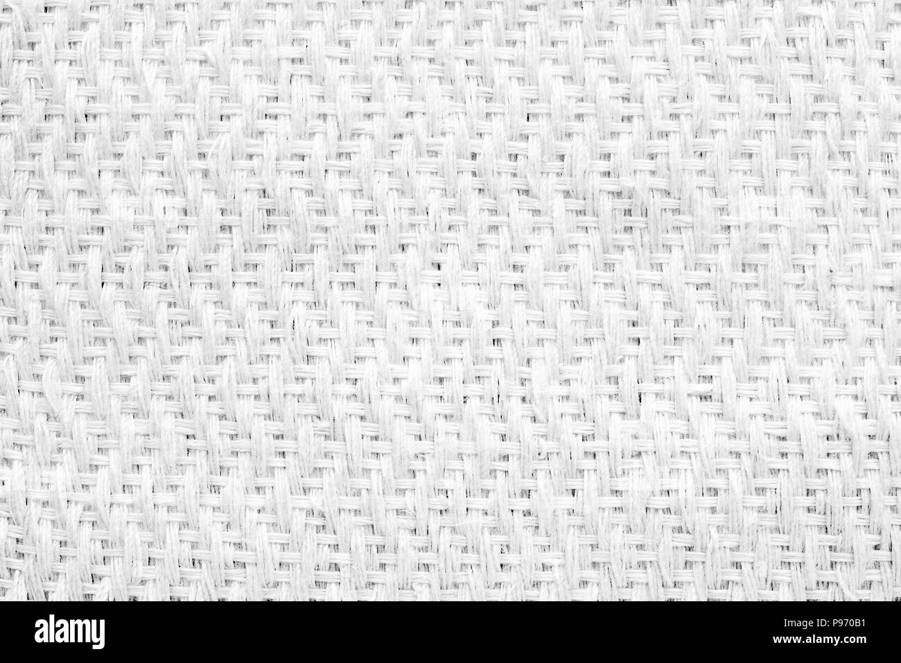 White hand weaving matting tweed fabric texture. Closeup horizontal ...