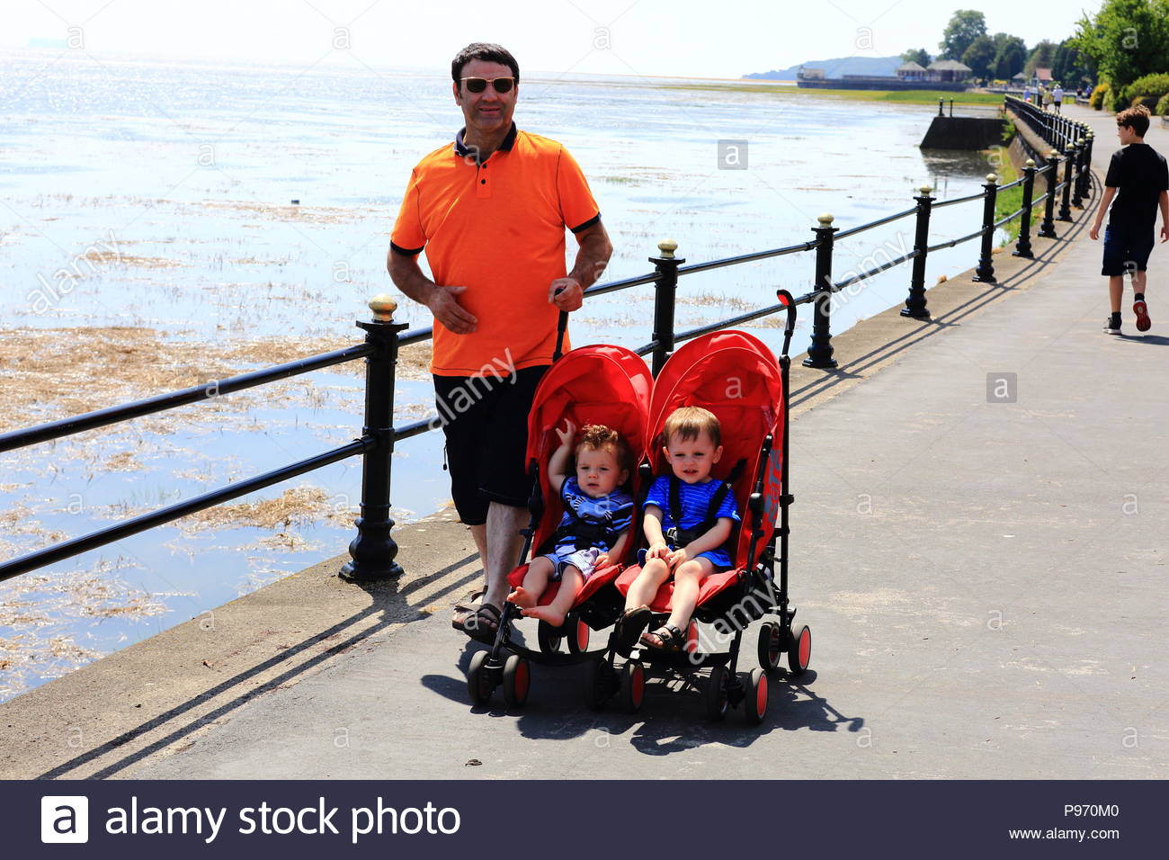 Pushing Child In Push Chair High Resolution Stock Photography and ...