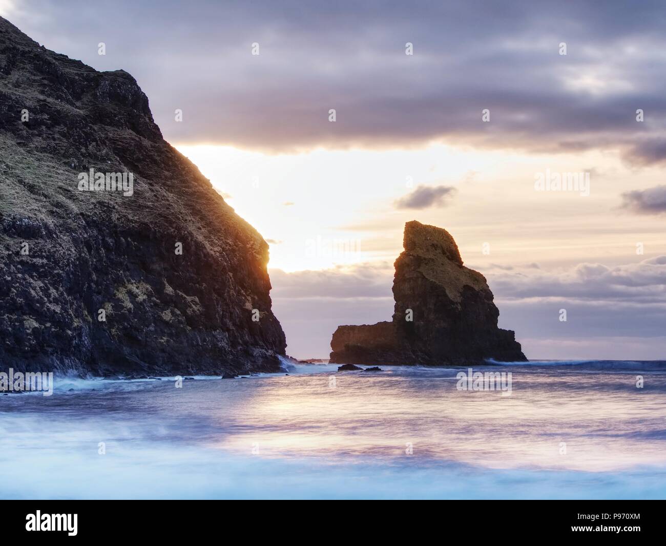 The rest of the day in rocky bay. Evening light on the rocks, boulders ...