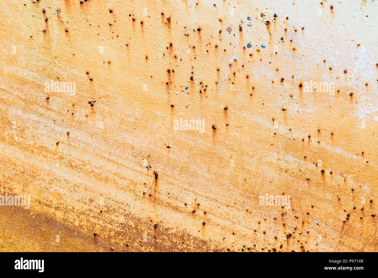 Texture of rusty colorful metal background with a peeling cracked ...