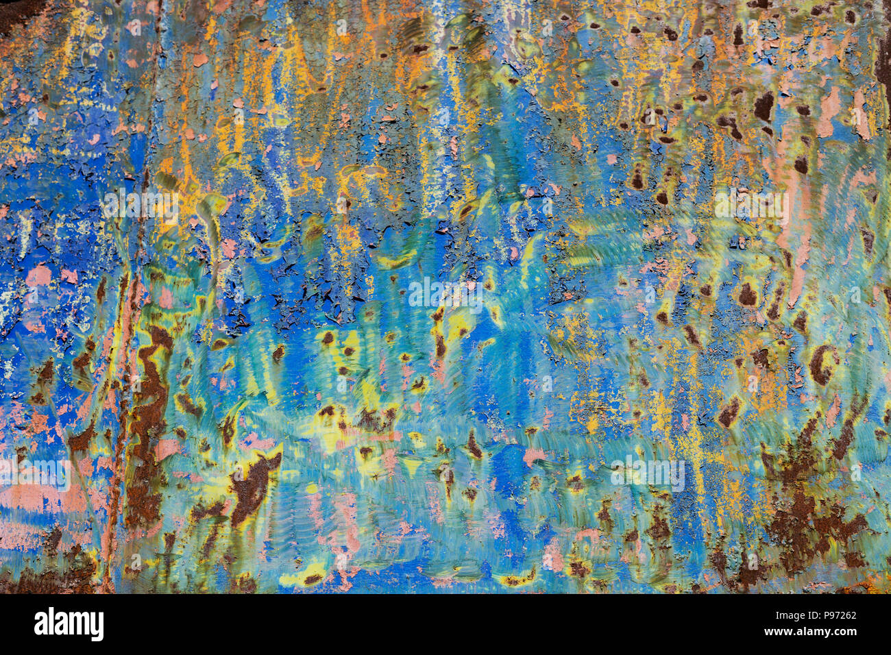 Texture of rusty colourful metal background with a peeling cracked ...