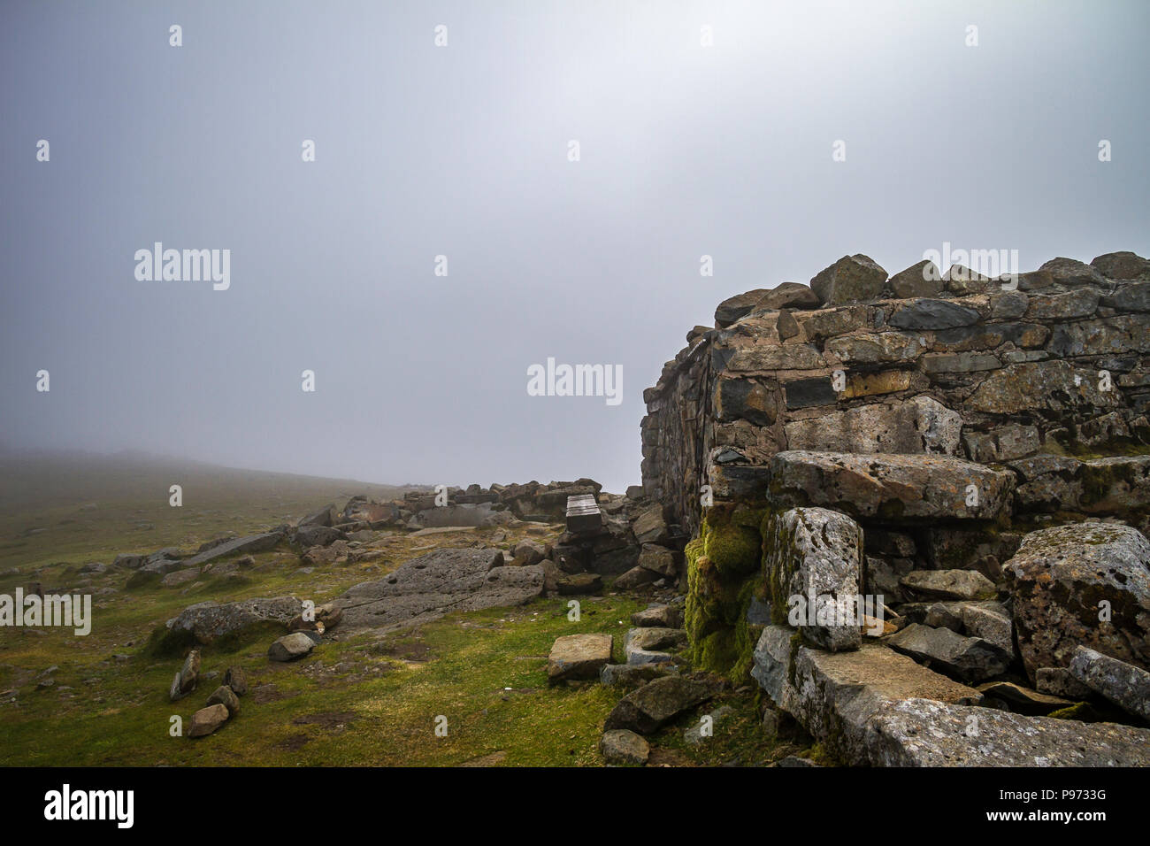 Ruins of an old farm building while out hiking one misty morning in ...