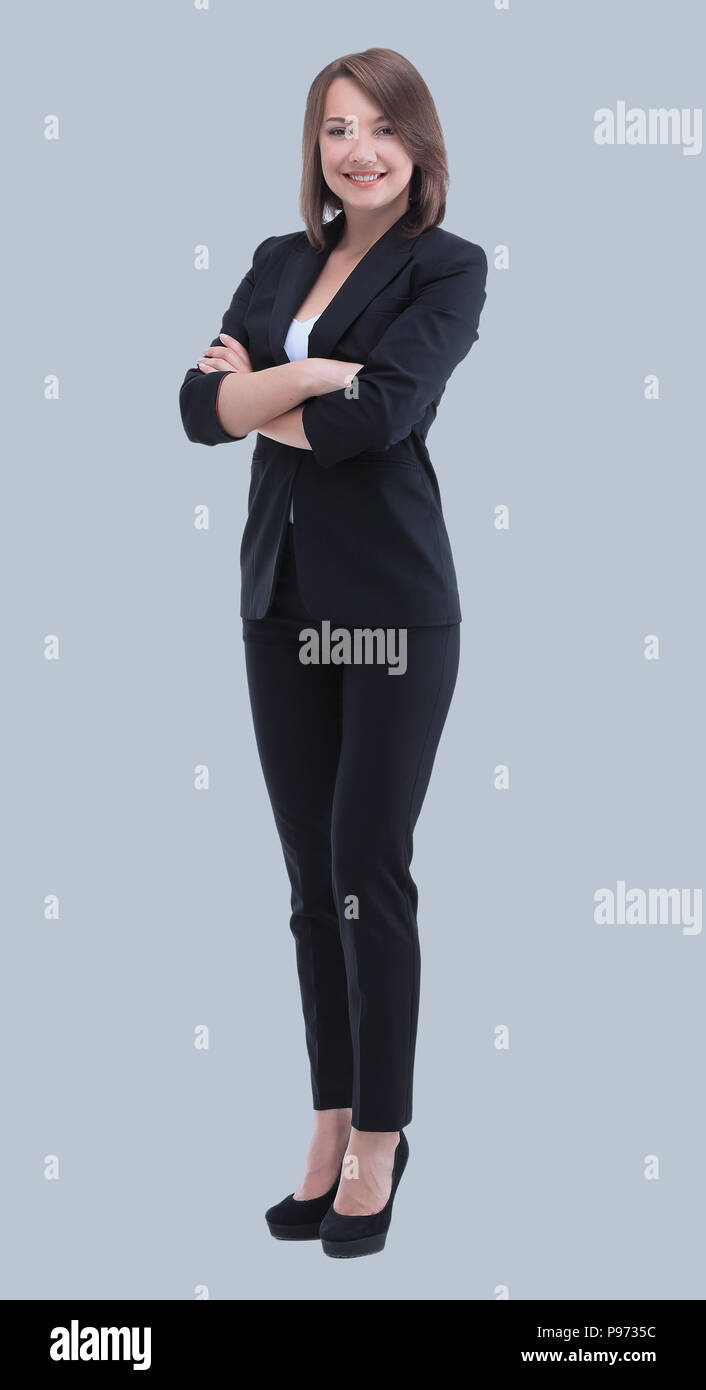 Gorgeous business woman full length isolated on gray Stock Photo - Alamy