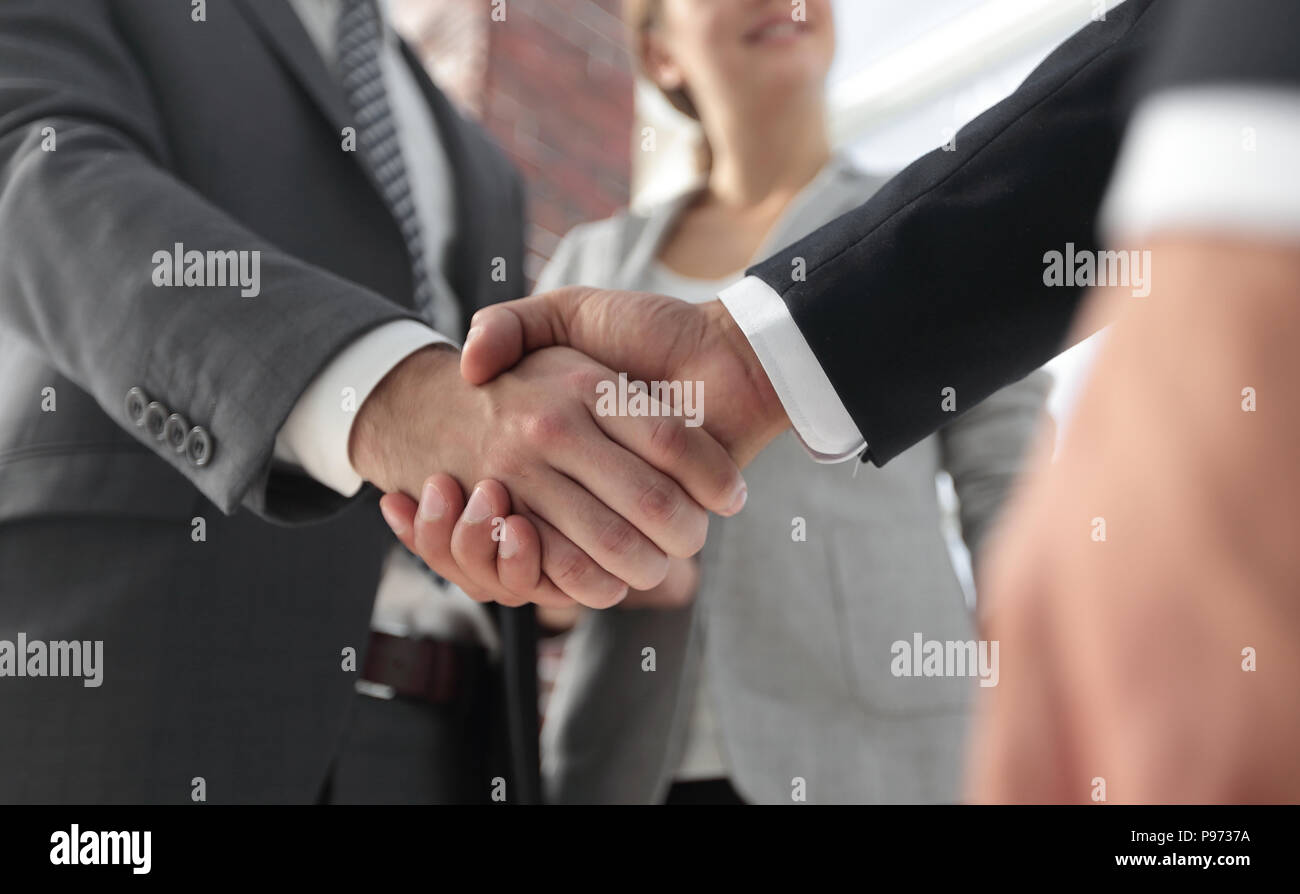 friendly handshake of business people Stock Photo - Alamy