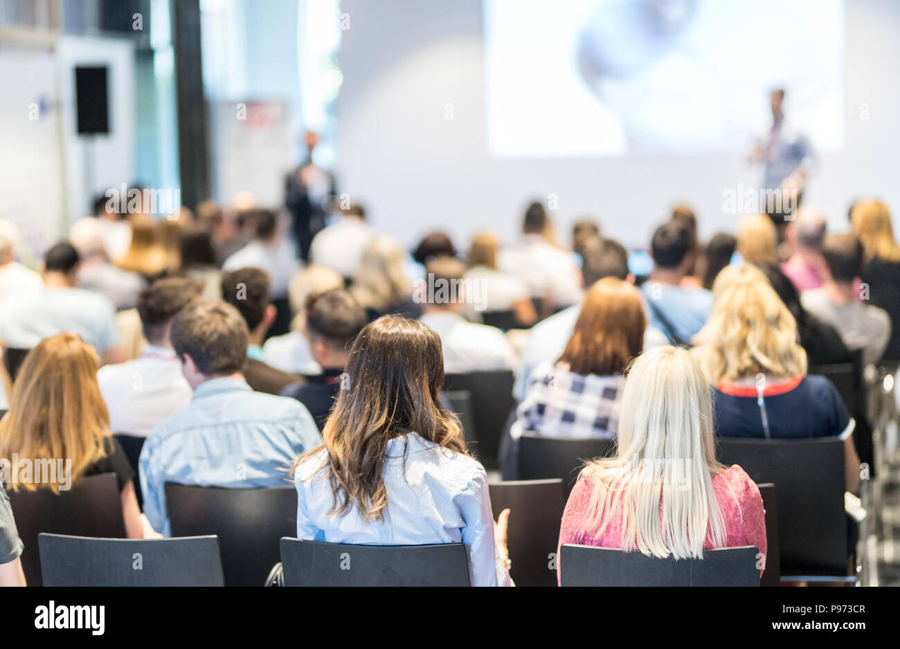 Business speaker giving a talk at business conference event Stock Photo ...
