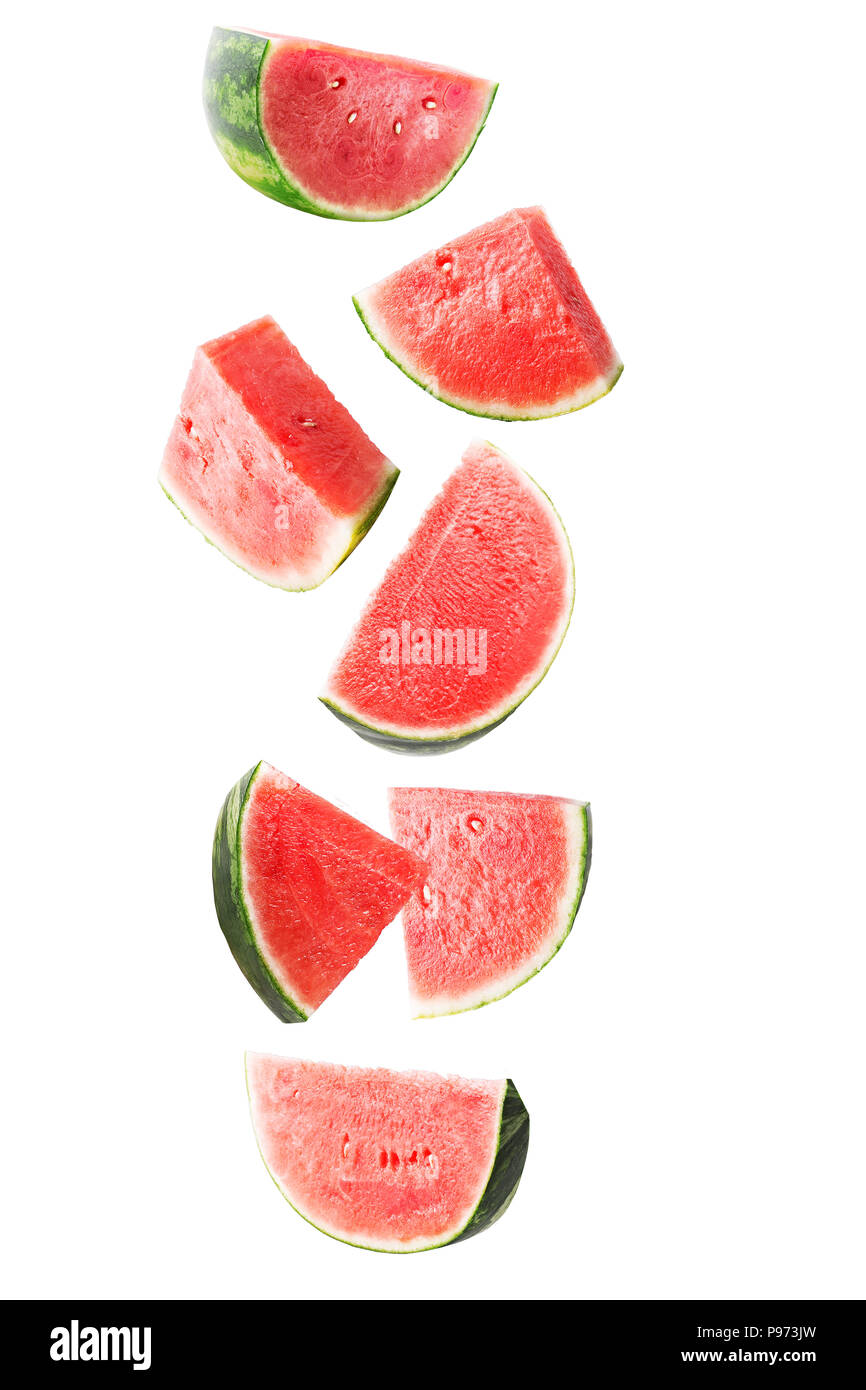Flying watermelon. Sliced red falling watermelon isolated on white ...