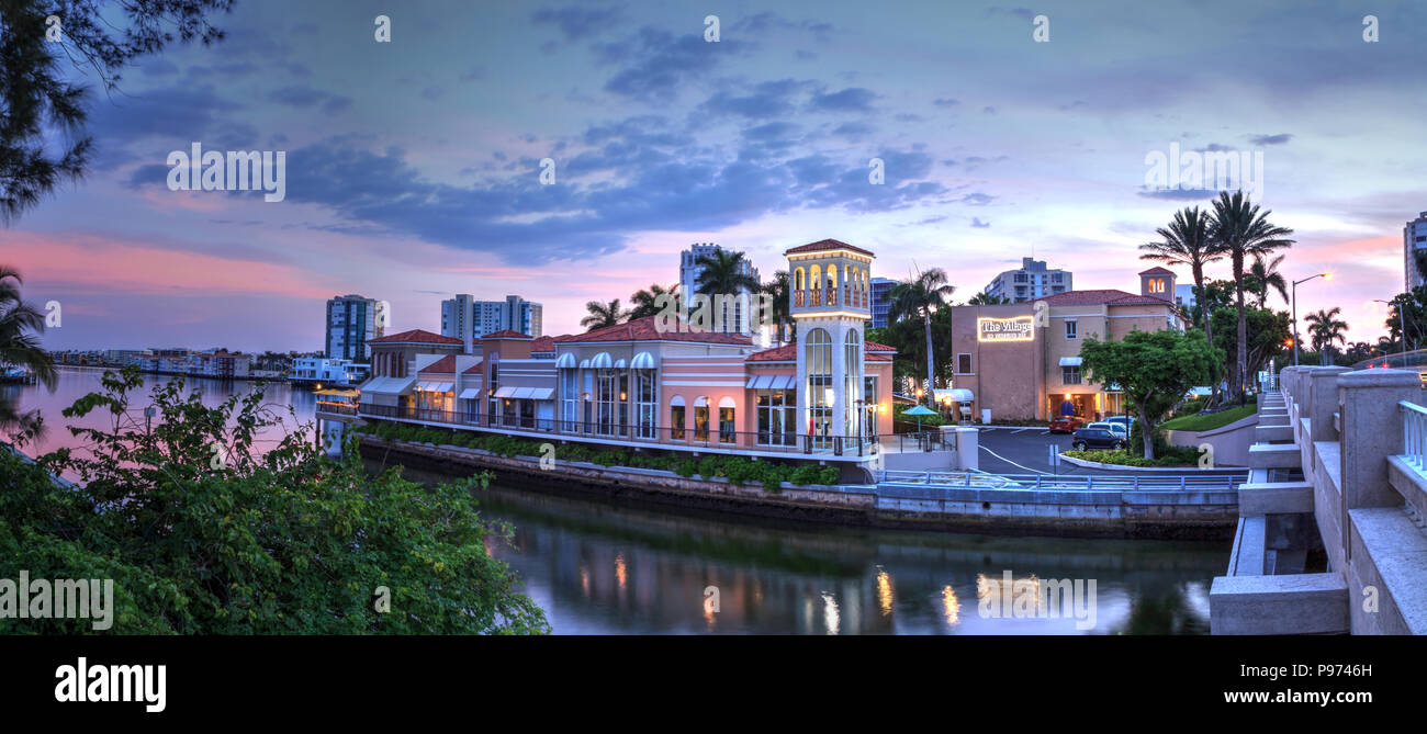 Naples, Florida, USA – July 14, 2018: Sunset over the colorful shops of ...
